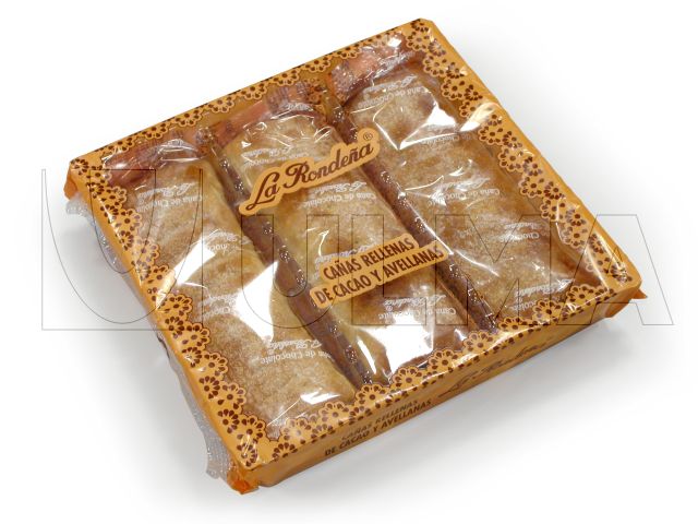 Cream-filled pastry rolls packaging in flow pack wrapper (HFFS) — ULMA ...