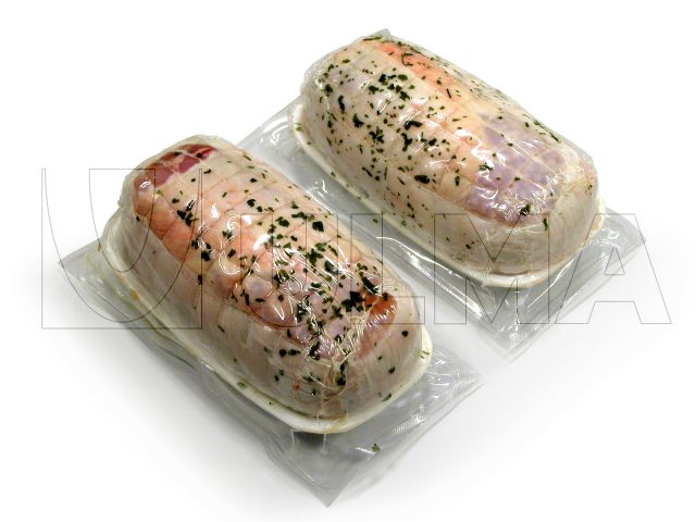 Chicken fillets vacuum packaging in thermoforming in flexible film ...